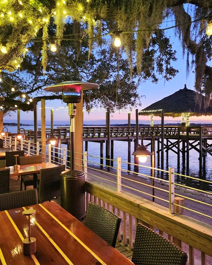 Sunset dining on the deck where string lights compete with stars. This is why Florida residents smugly smile when northerners complain about winter. 
