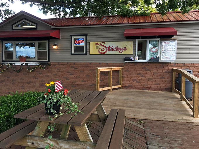 The outdoor seating area where sticky bun enthusiasts engage in the sacred ritual of licking fingers and debating which variety reigns supreme.