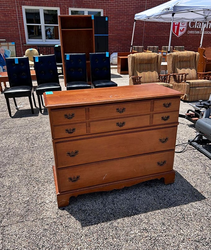 Outdoor furniture finds bask in the sunshine, proving that yesterday's dining sets and dressers are tomorrow's refurbished treasures.
