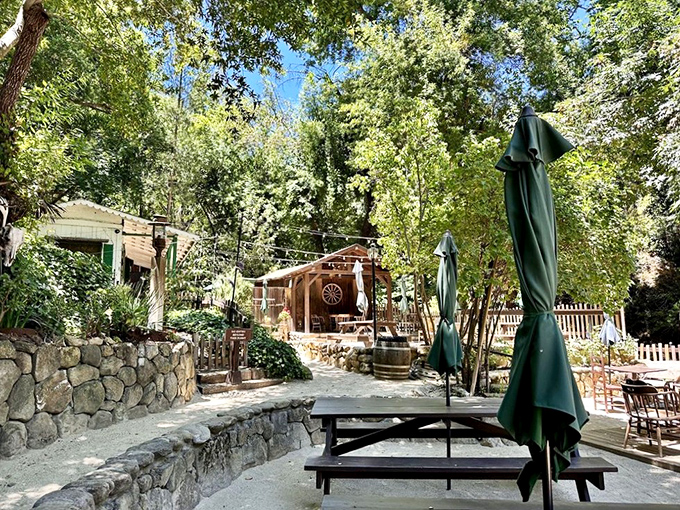 Sun-dappled serenity: This outdoor patio offers a peaceful respite where dappled light filters through ancient oaks and mountain breezes carry whispers of the past.