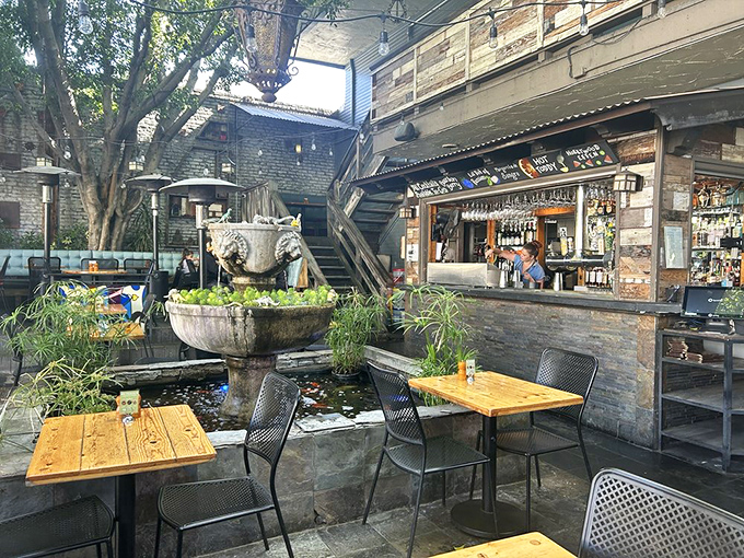 The outdoor patio with its stone fountain creates an urban oasis where you can pretend you're in Tuscany instead of Los Angeles.