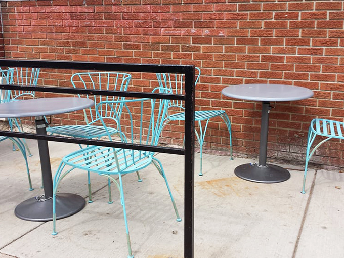 Turquoise chairs invite you to linger with your treasures. The outdoor seating says "stay awhile" even as your pastry says "eat me now."