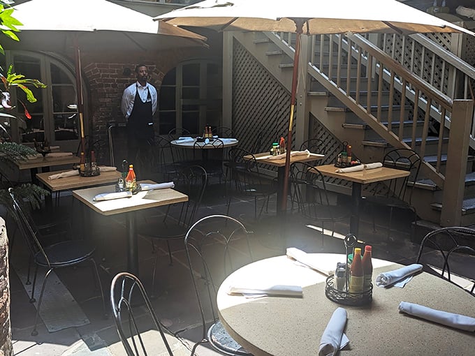 The courtyard dining area offers a breath of fresh air and dappled sunlight&mdash;nature's perfect seasoning for any meal.