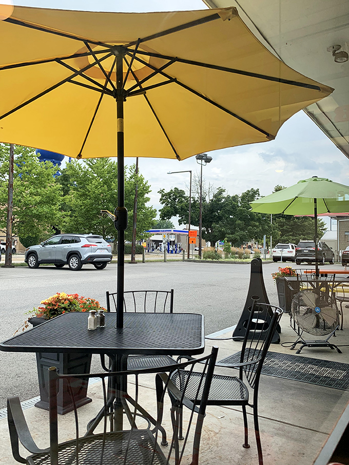 Outdoor seating where you can watch Carnegie go by while protected by cheerful umbrellas &ndash; breakfast and a show.