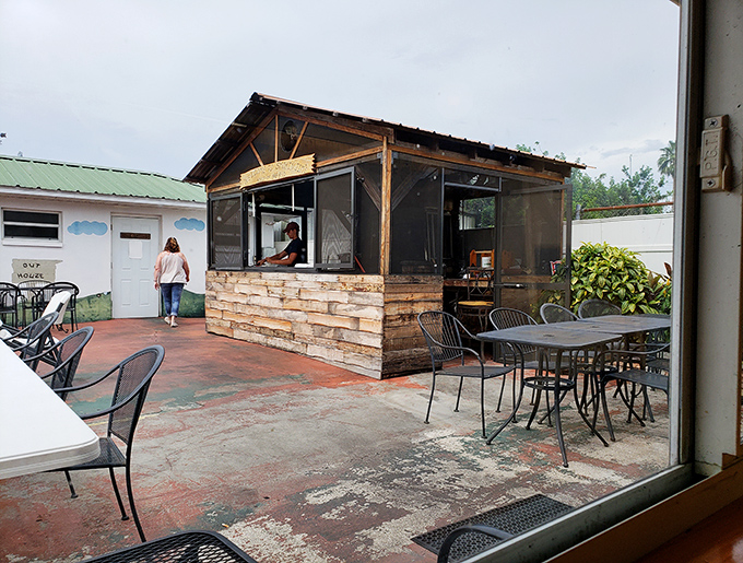 The outdoor seating area: where sauce-stained shirts happen and nobody judges, because they're wearing one too.