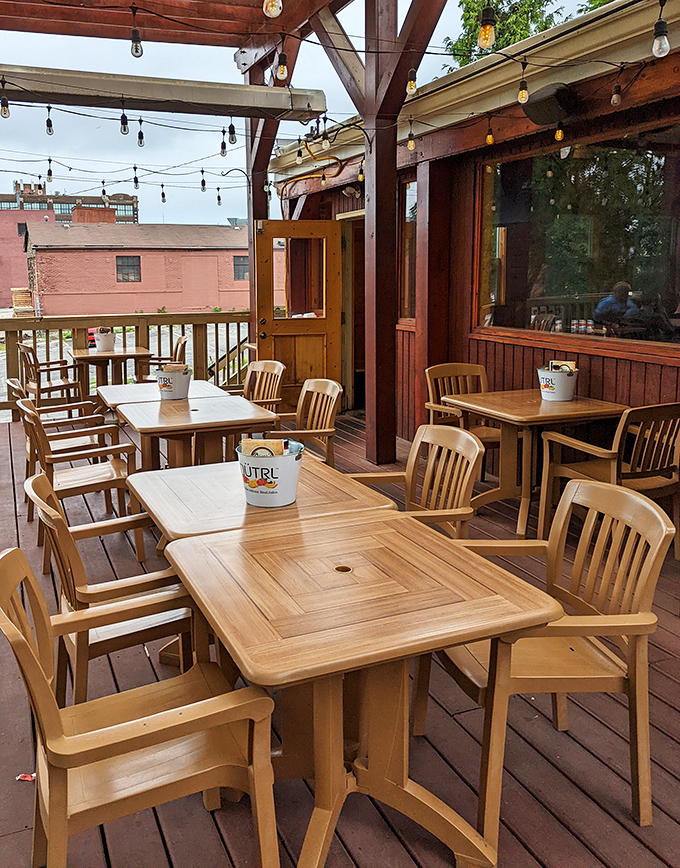 Outdoor seating where summer evenings stretch like taffy and conversations flow as freely as the local brews.