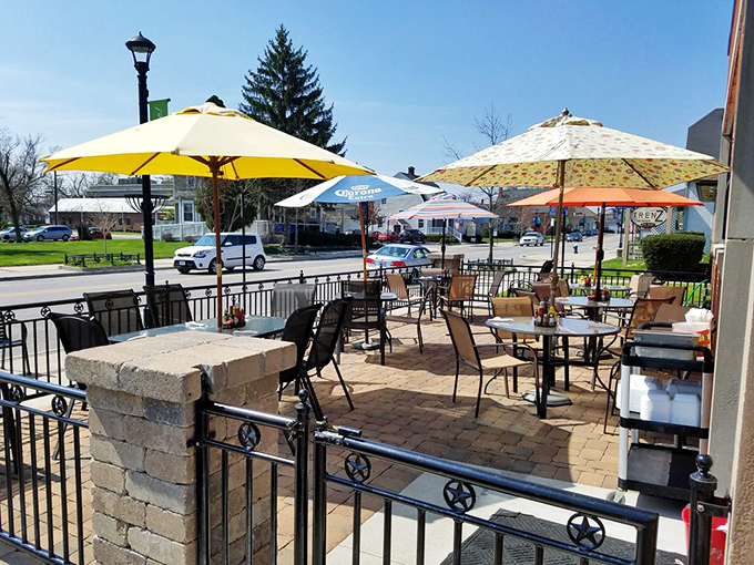 Summer on the patio&mdash;where yellow umbrellas bloom like dandelions and conversations flow as freely as the sunshine.