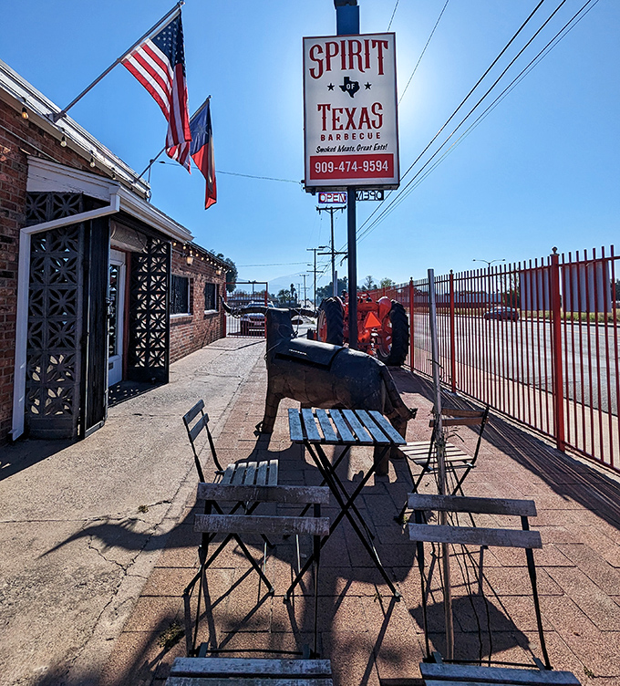 Al fresco dining, Texas-style. That smoker in the background isn't just equipment&mdash;it's the beating heart of this barbecue sanctuary.