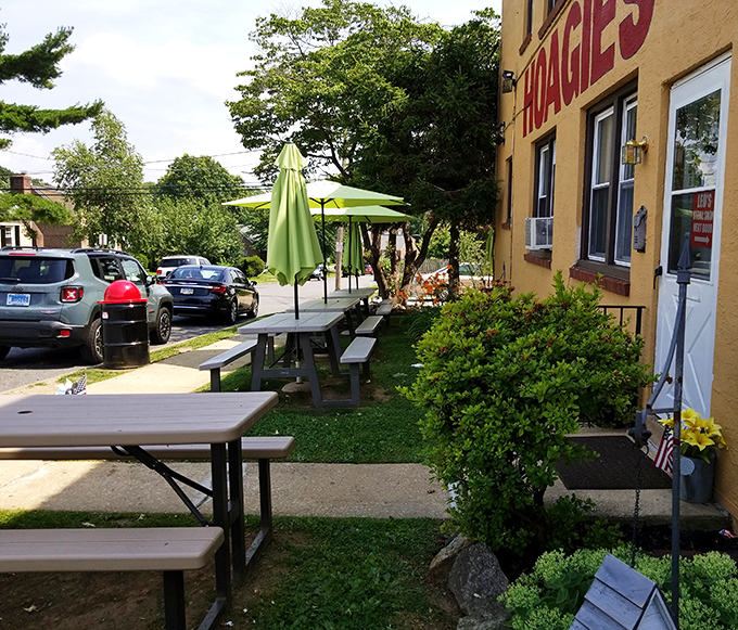 Al fresco dining, Leo's style&mdash;picnic tables under green umbrellas where the only thing better than the sandwiches is enjoying them in the fresh air.