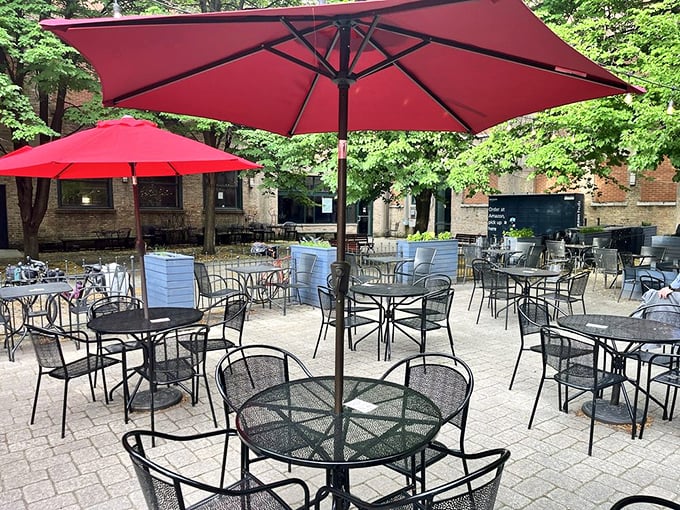 The outdoor patio &ndash; Chicago's reward for surviving winter. Those red umbrellas standing guard against the sun while you focus on the important business of eating.