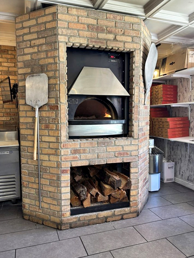 Not just any oven&mdash;a brick fortress dedicated to the art of perfect bread. The wood below suggests they take their baking very seriously.