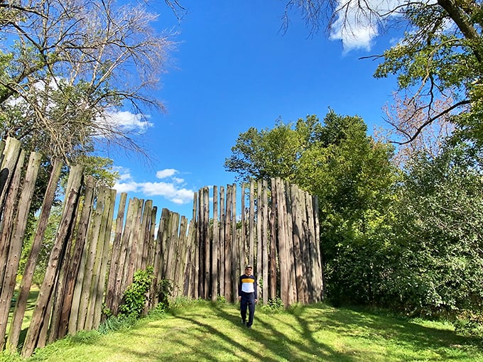 The reconstructed palisade wall offers a tangible connection to the past&mdash;ancient security systems before home insurance was a thing.