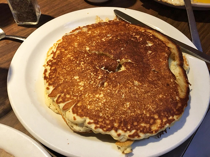 This golden-brown pancake spans the plate like a delicious solar eclipse. One bite and your hunger disappears just as completely.