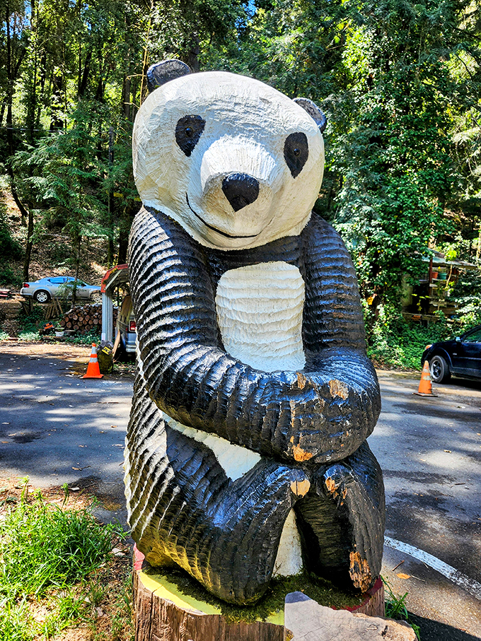 This charming wooden panda sculpture greets visitors with a friendly face &ndash; handcrafted whimsy that's become increasingly rare in our digital world.