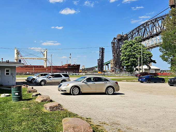 The parking lot where food pilgrims gather, drawn by the magnetic pull of exceptional burgers.