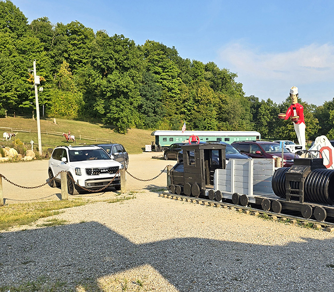Theme park for train enthusiasts! The parking area features whimsical train-themed decorations that set the stage for your dining adventure.