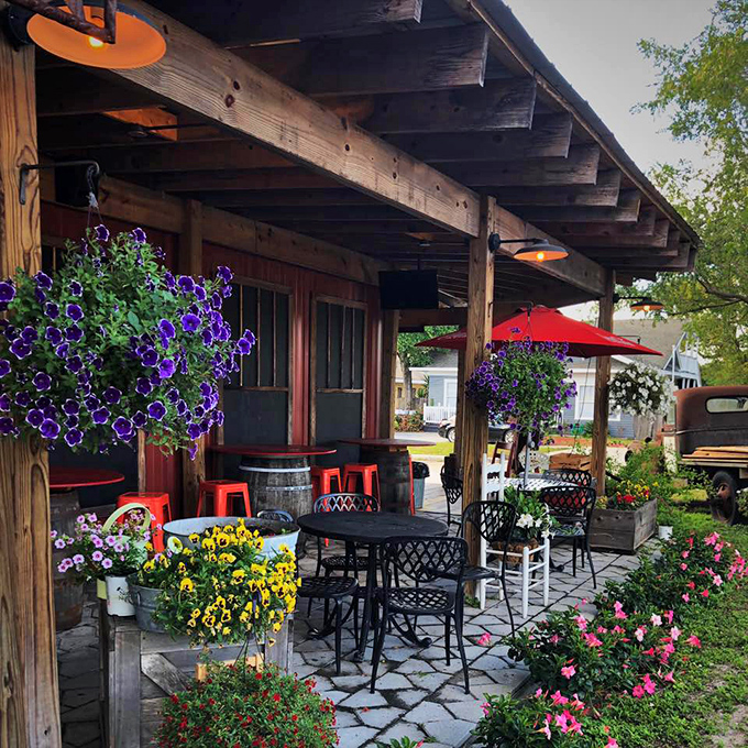The patio blooms with both flowers and conversation&mdash;a perfect Florida setting where coffee cools at exactly the right pace.