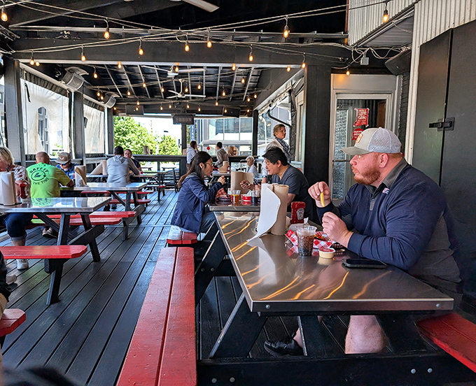 The covered patio isn't just outdoor seating&mdash;it's where spice warriors recover in the fresh air, comparing heat-level war stories with neighboring tables.