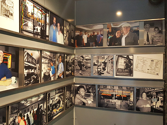 Wall of fame that tells the story of a beloved institution &ndash; decades of memories, celebrity visits, and the faces that make Sip & Bite special.