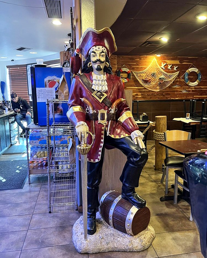 The pirate statue stands guard over the dining room&mdash;a silent sentinel ensuring your seafood experience is nothing short of legendary.