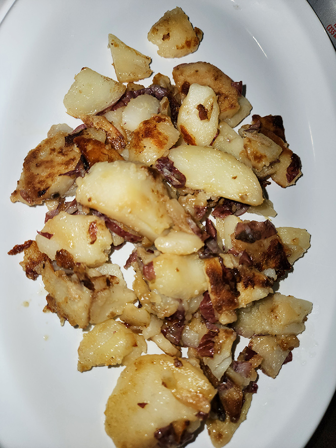 These home fries are the unsung heroes of breakfast&mdash;crispy edges, tender centers, with bits of onion playing hide and seek throughout.