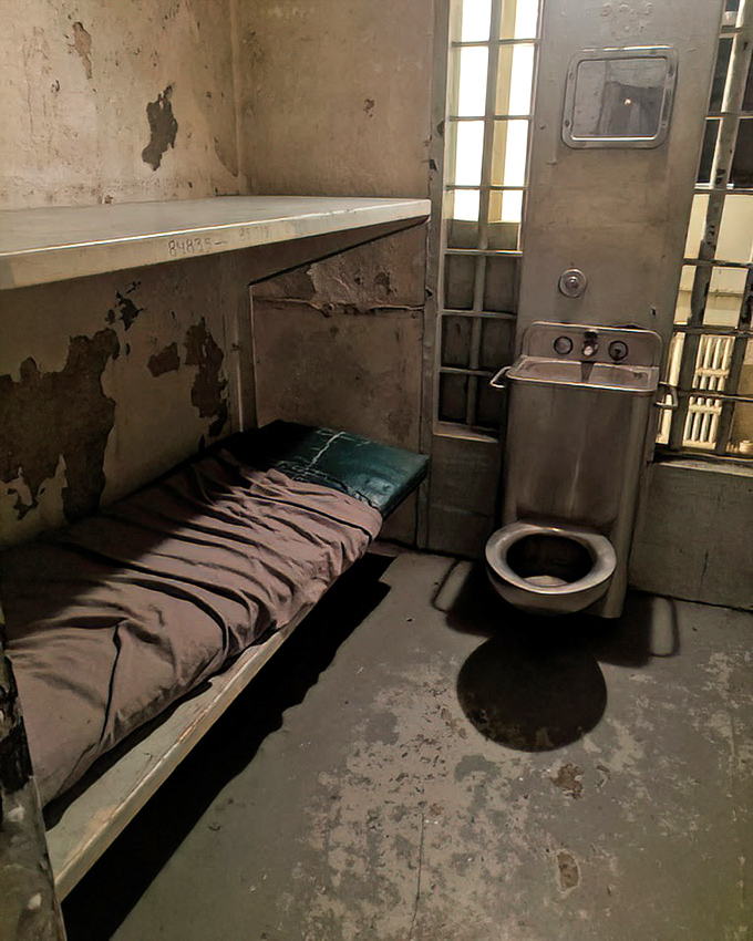 The ultimate in minimalist living&mdash;a metal slab for sleeping, institutional toilet, and not an inch of privacy. Hotel stars? Zero. Historical significance? Five.