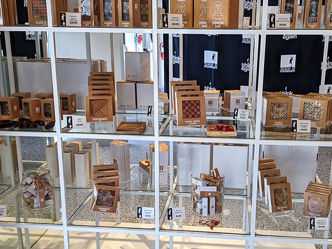 Brain teasers and puzzles in the museum shop challenge visitors to continue the mind-bending experience long after they've returned home.