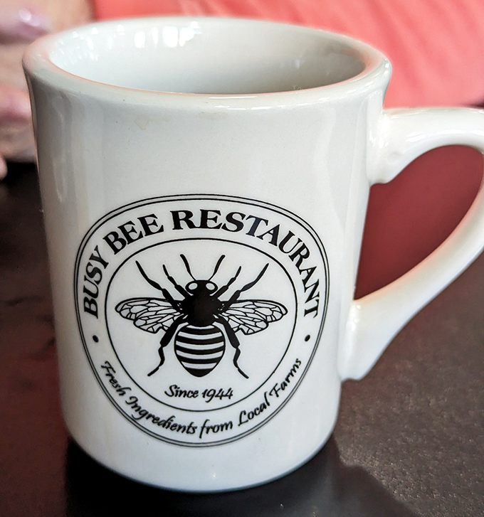 This isn't just a coffee mug&mdash;it's a membership card to the "I know where the good food is" club. Note the "Fresh Ingredients from Local Farms" promise.
