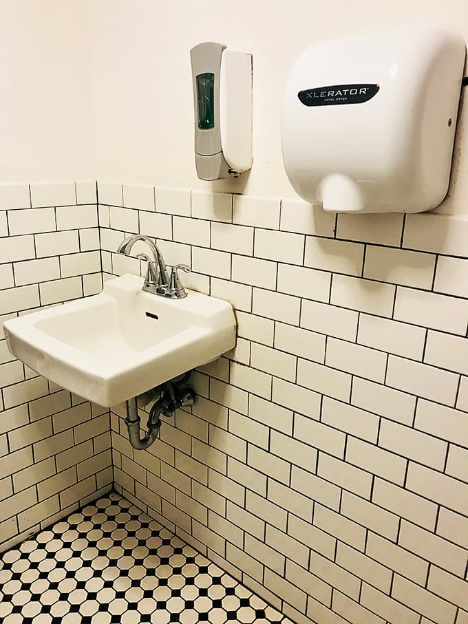 Even the restroom has that classic Philly vibe&mdash;practical, no-nonsense, and surprisingly photogenic with its vintage tile work.