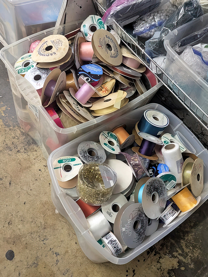 A crafter's dream come true: ribbons and spools in every color imaginable, like a rainbow exploded into perfectly organized plastic bins.