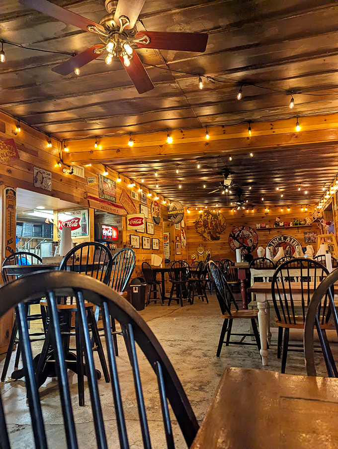 The dining room feels like your coolest friend's cabin, if that friend happened to be obsessed with perfect lighting and barbecue memorabilia.