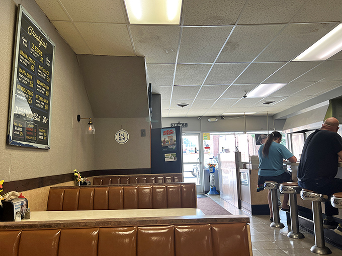 Booths that have witnessed first dates, family traditions, and solo diners savoring a moment of hot dog bliss. If these seats could talk...