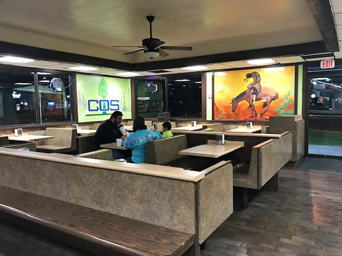 The dining room's vintage booths have witnessed countless first dates, family dinners, and solo feasts&mdash;if only these walls could talk!