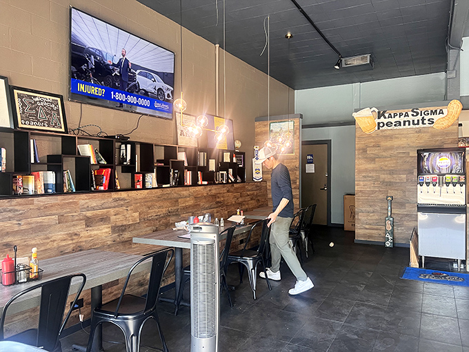 The modern cafe aesthetic meets classic diner functionality&mdash;where wood-paneled walls and metal chairs create the perfect backdrop for breakfast epiphanies.