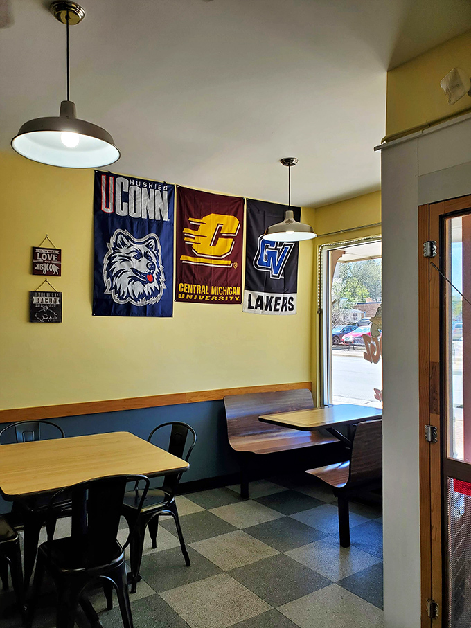 College banners create a hometown atmosphere where every meal feels like a celebration.