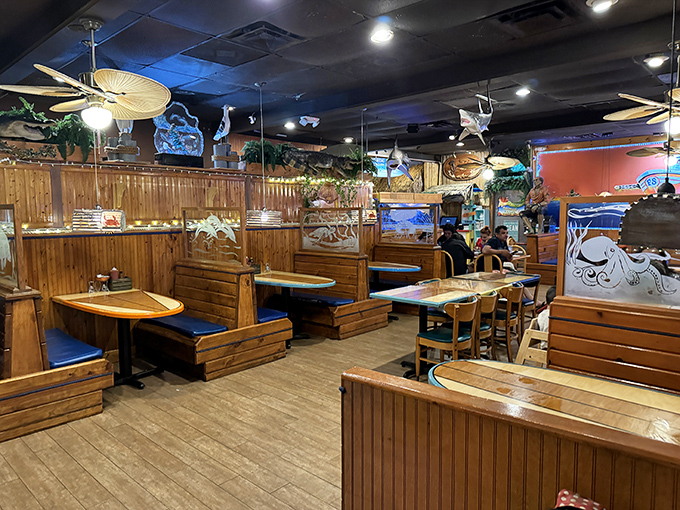 Wooden booths create cozy nooks for intimate conversations &ndash; or serious strategic planning for your seafood attack.