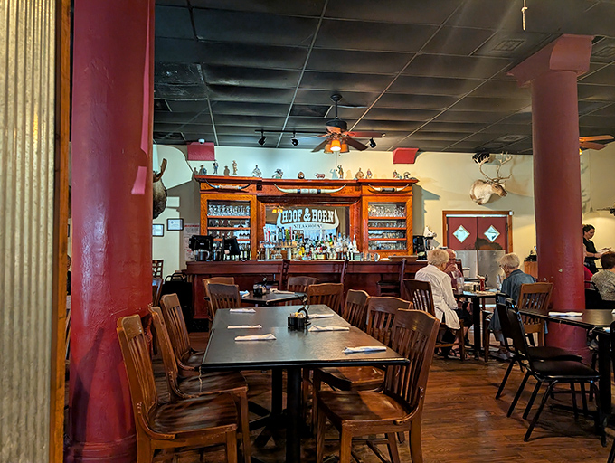 Tables arranged for both intimate conversations and boisterous family gatherings, with wooden chairs that have supported decades of satisfied diners. 