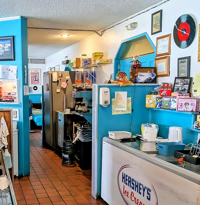 The service counter isn't just where orders happen&mdash;it's mission control for comfort food operations, complete with nostalgic decorations that tell stories without saying a word.