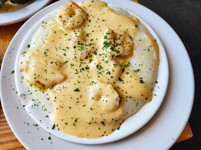 Creamy shrimp and grits that would make any Charlestonian proud&mdash;comfort food elevated to an art form with fresh herbs as the finishing touch.
