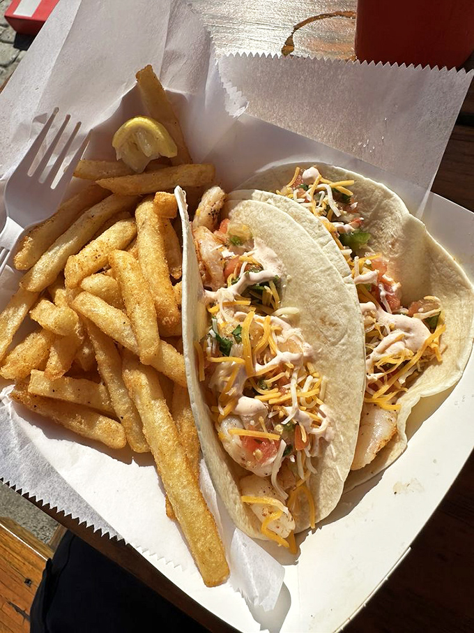Tacos that take seafood to new heights &ndash; fresh fish, crisp veggies, and melty cheese creating the perfect handheld vacation for your taste buds.