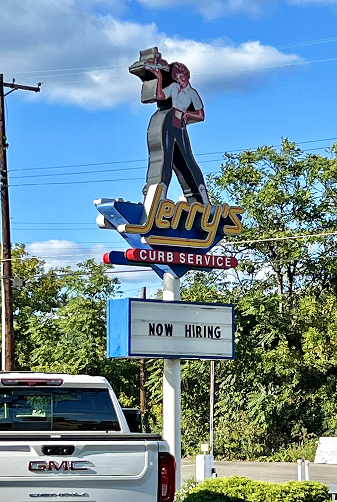 The iconic Jerry's sign waves hello like a cheerful friend, complete with that classic carhop figure beckoning you inside.