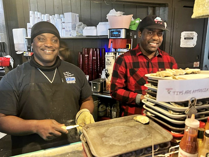 The unsung heroes behind every perfect oyster. Their smiles suggest they know they're creating memories, not just meals.
