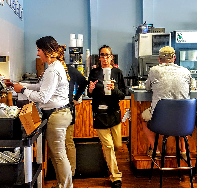 The staff moves with the practiced grace of people who genuinely enjoy feeding folks who appreciate good food.