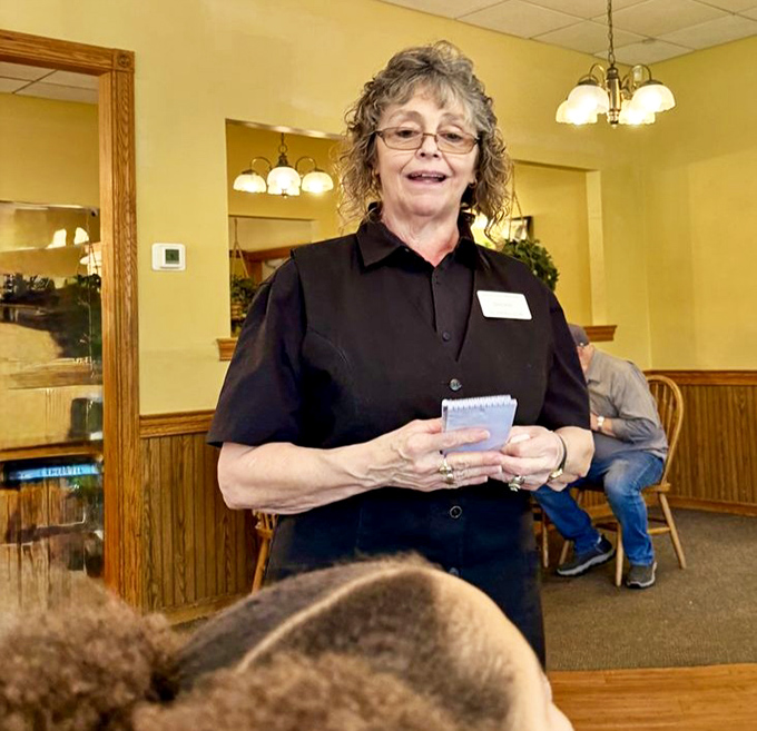 Every small town has that one server who's seen it all, remembers your usual order, and somehow makes you feel like you've come home.