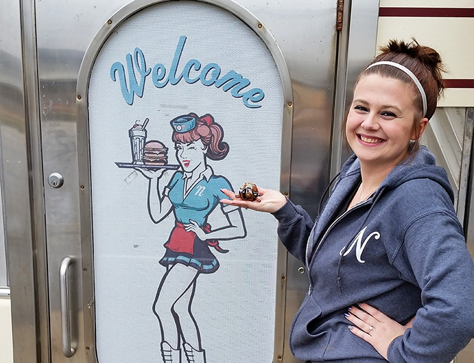 The welcome sign featuring a classic diner waitress sets the tone&mdash;this place serves nostalgia alongside its famous pies and burgers.