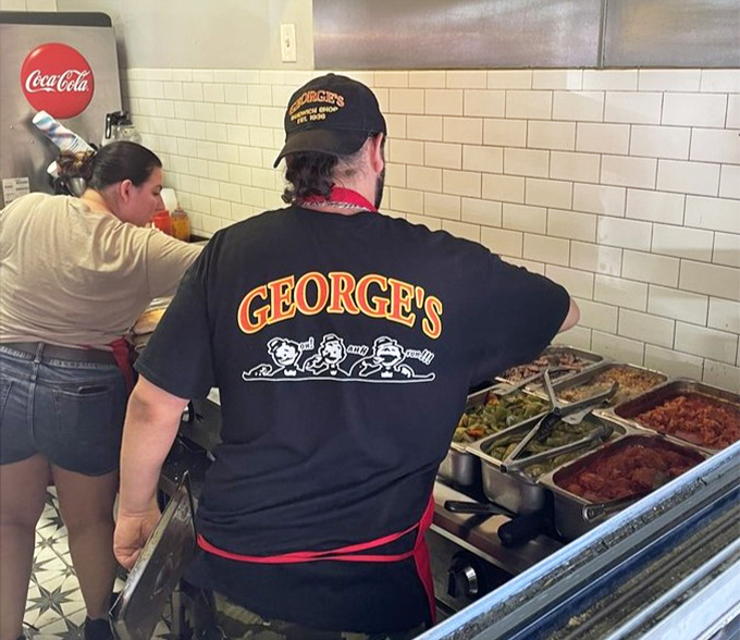 George's staff wear their branded uniforms with the quiet pride of people who know they're part of something special.