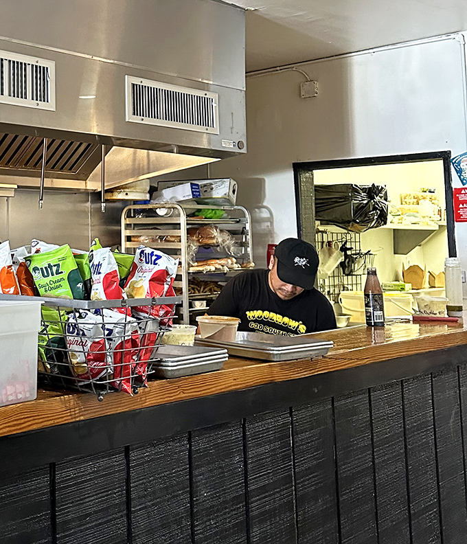 The friendly face behind the counter who's about to hand you sandwich nirvana wrapped in foil.