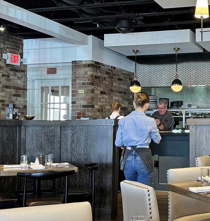 The restaurant's interior balances rustic charm with modern sensibility—like your favorite jeans paired with a tailored blazer.