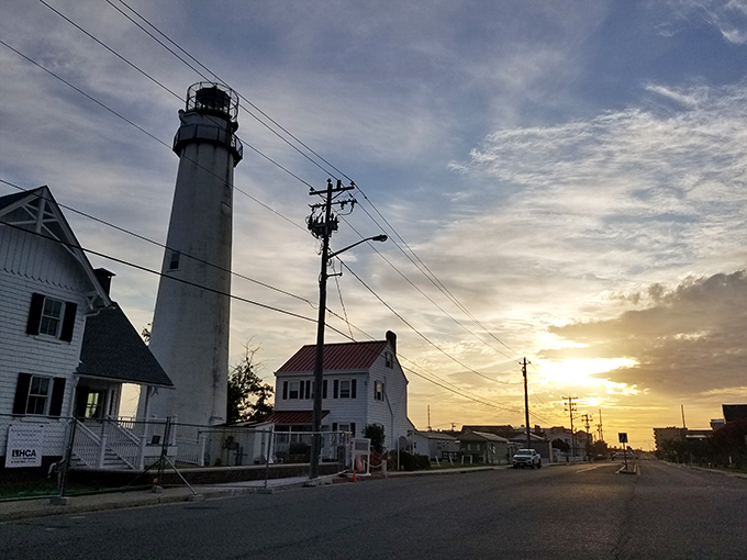 Sunset transforms the lighthouse into a silhouette worthy of a tourism brochure or your next holiday card background.