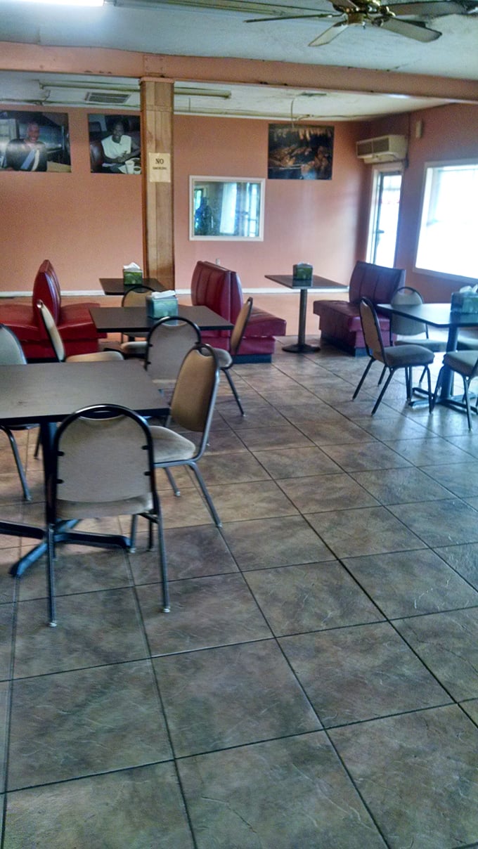 Pink walls and red booth seating create the perfect backdrop for the main attraction&mdash;plates that will soon be stained with the evidence of barbecue bliss.